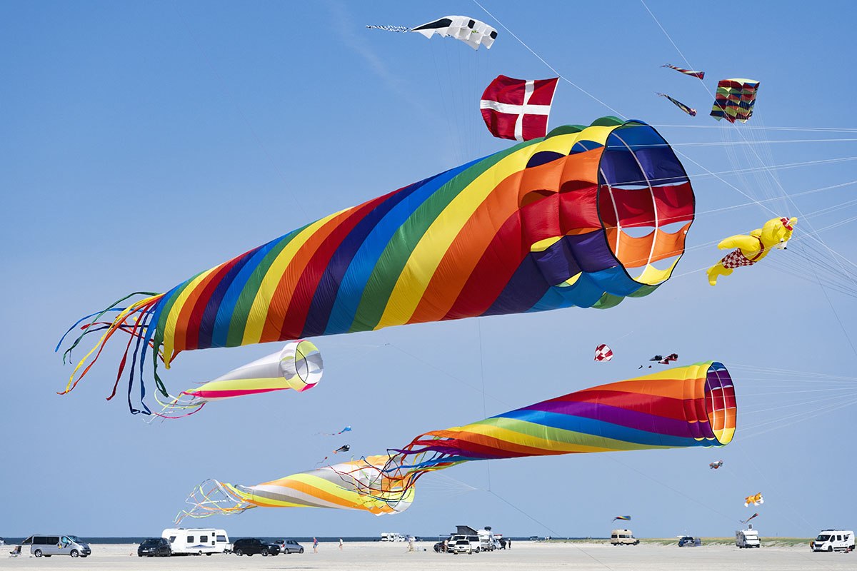 Why Do People Gather to Watch Kites in the Sky?